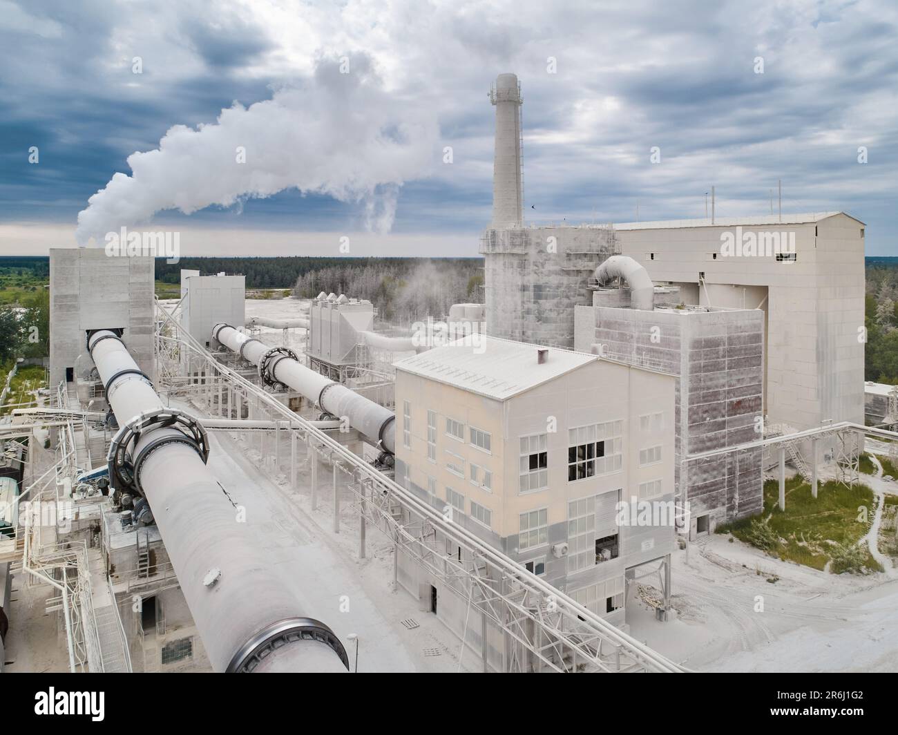 Calx roasting rotating furnace with pipe and steam at plant Stock Photo ...