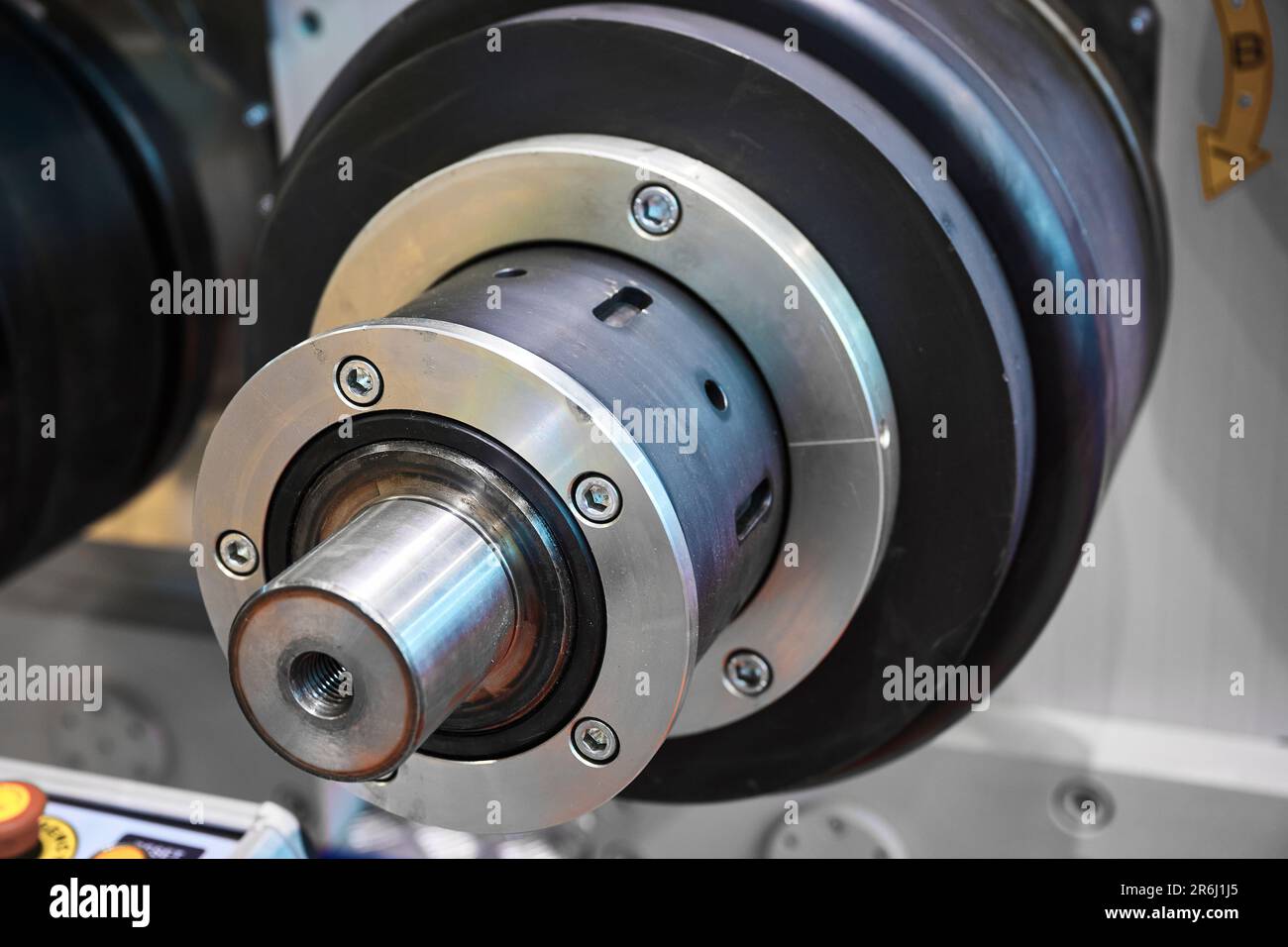 Machine with black hardened steel rollers to roll wire and control ...