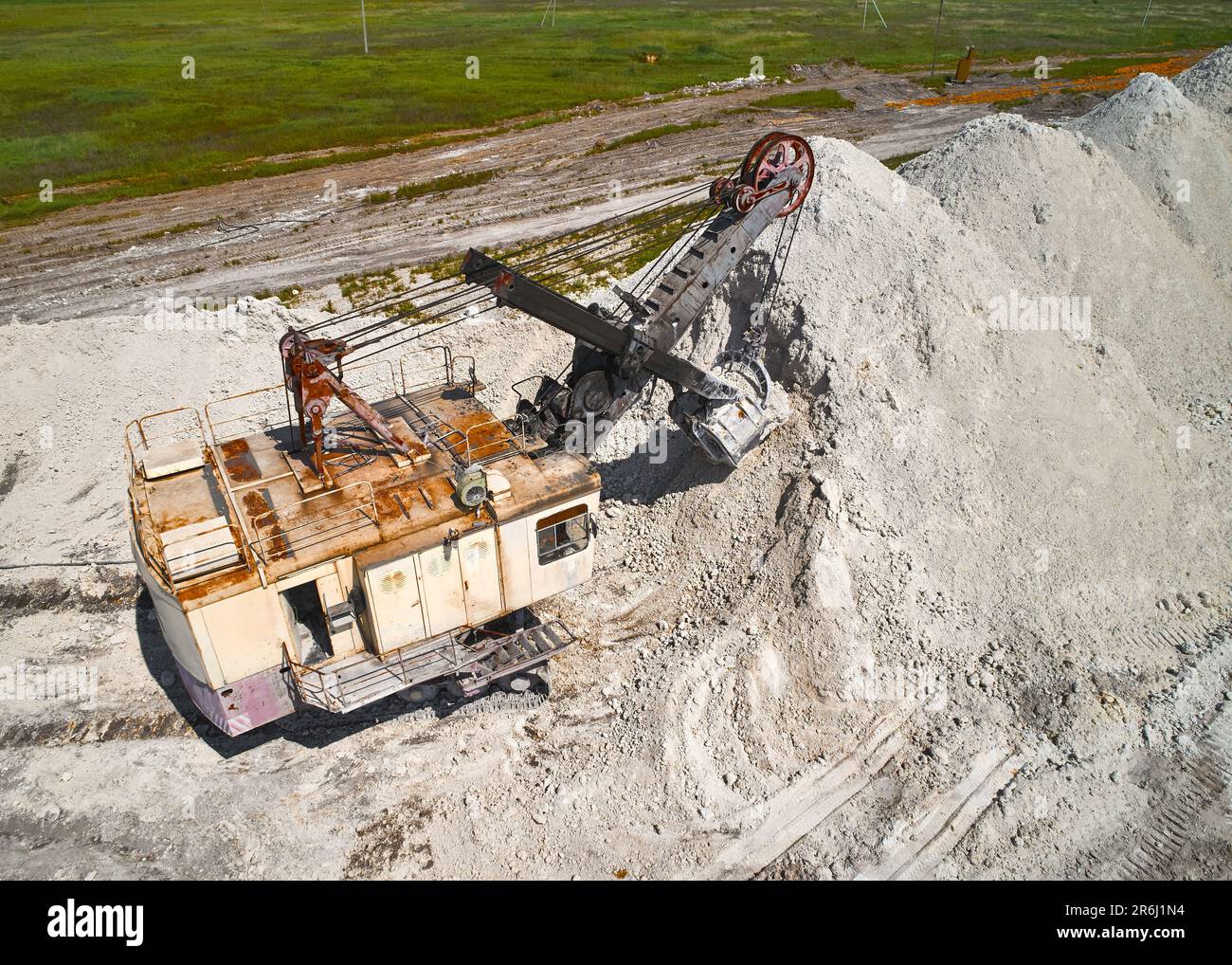 Tipper truck and Shovel mining excavator in mining quarry Stock Photo ...