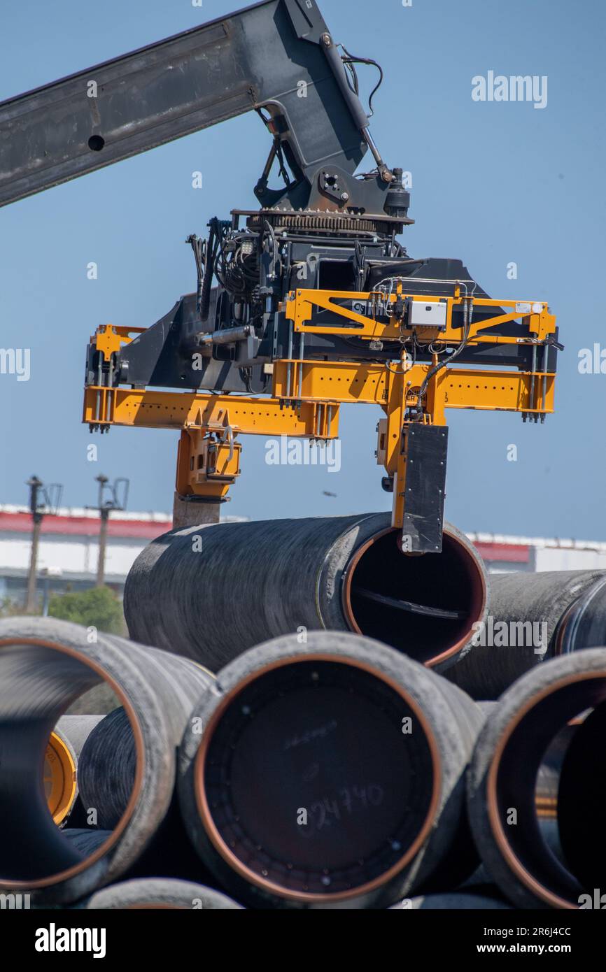 Mukran, Germany. 08th June, 2023. A special crane is used to transport ...