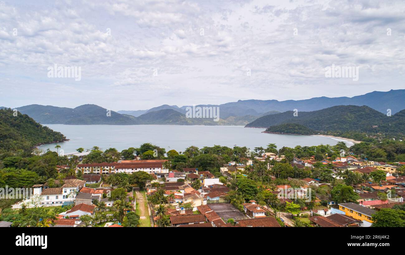 Aerial view of town and Praia do Lazaro (Lazaro beach) with sky ...