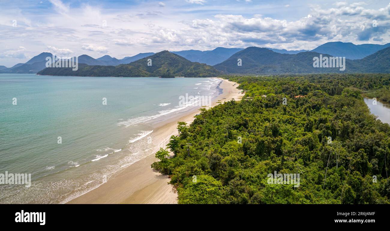 Aerial view along a Green Coast bay with turquoise water, beach, river ...