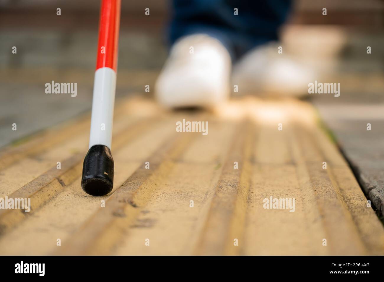 Person walking on tactile paving hi-res stock photography and images ...