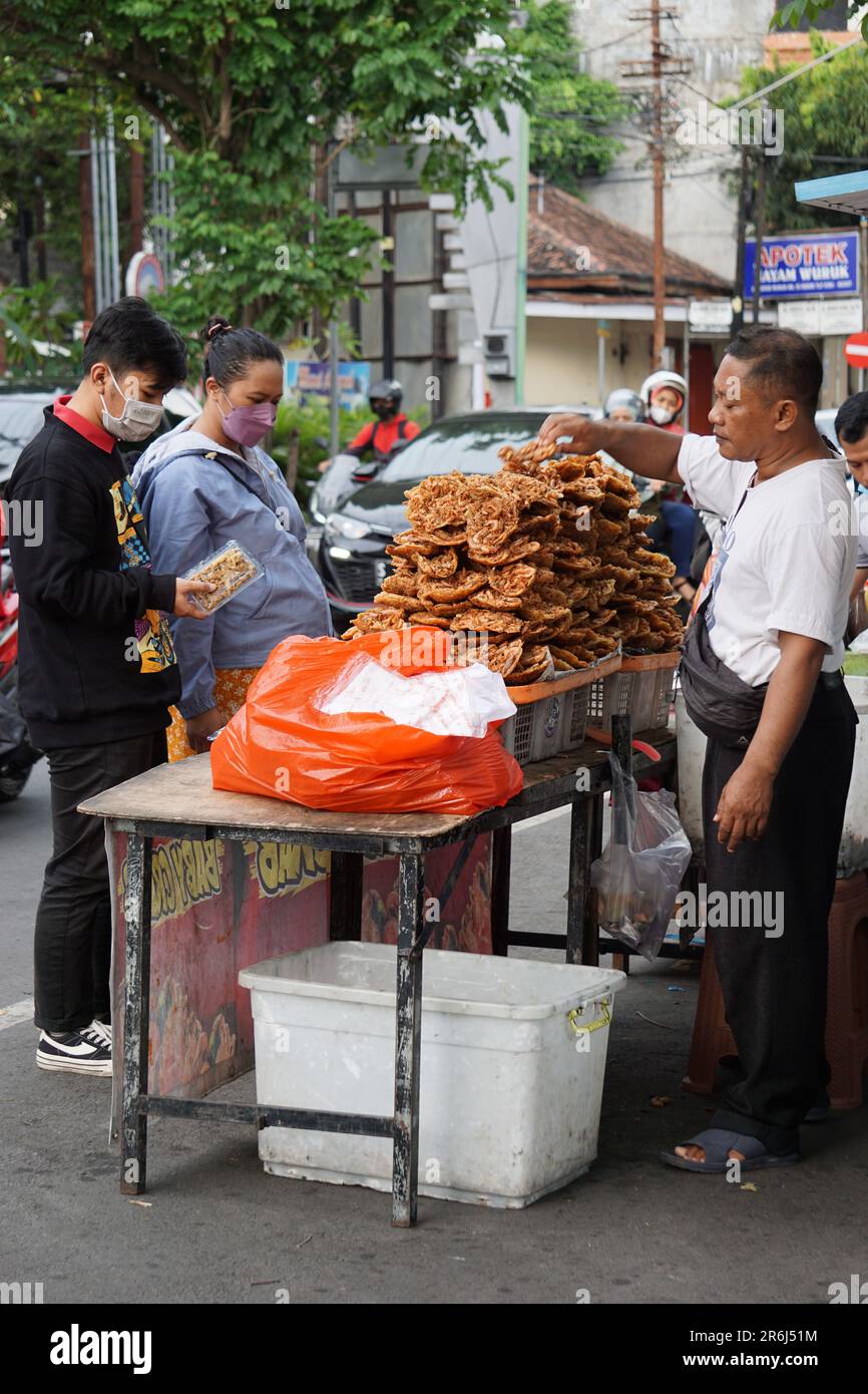 The seller of peyek. Peyek is one of Indonesian traditional crackers ...