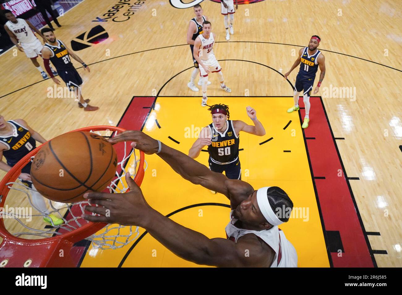 Miami Heat forward Jimmy Butler dunks against the Denver Nuggets during ...