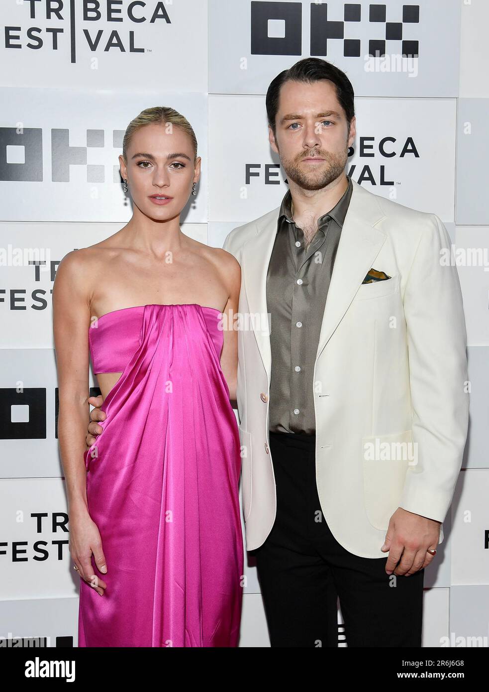 Sophie Skelton, left, and Richard Rankin pose together at the premiere ...