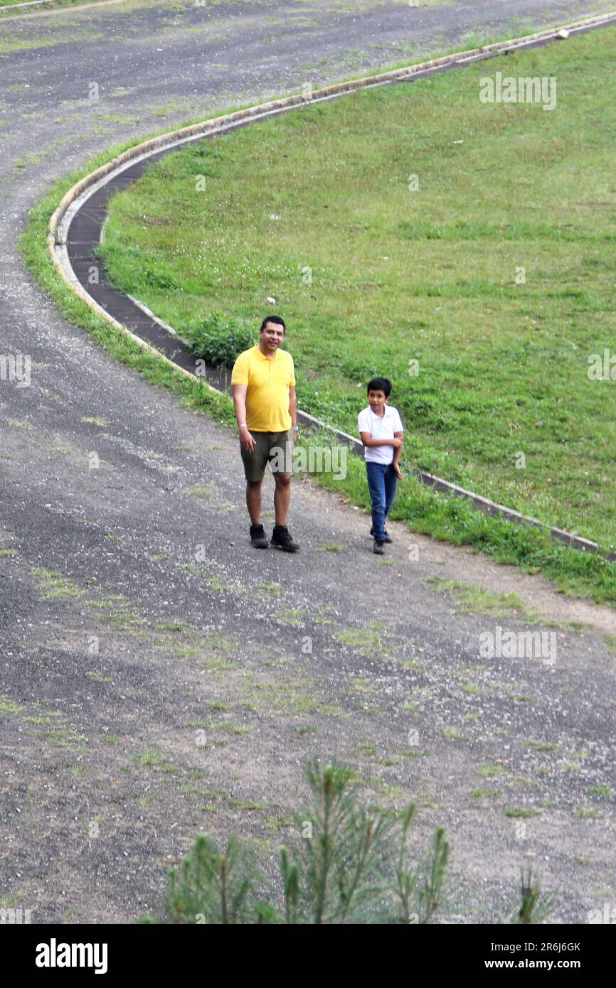 Divorced single dad plays sports together with his dark-haired Latino ...