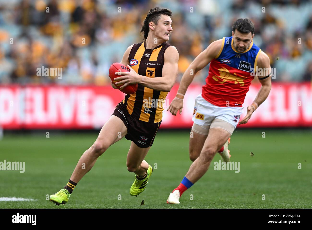 Melbourne, Australia. 10th June, 2023. Connor MacDonald of Hawthorn (left) in action during the ...