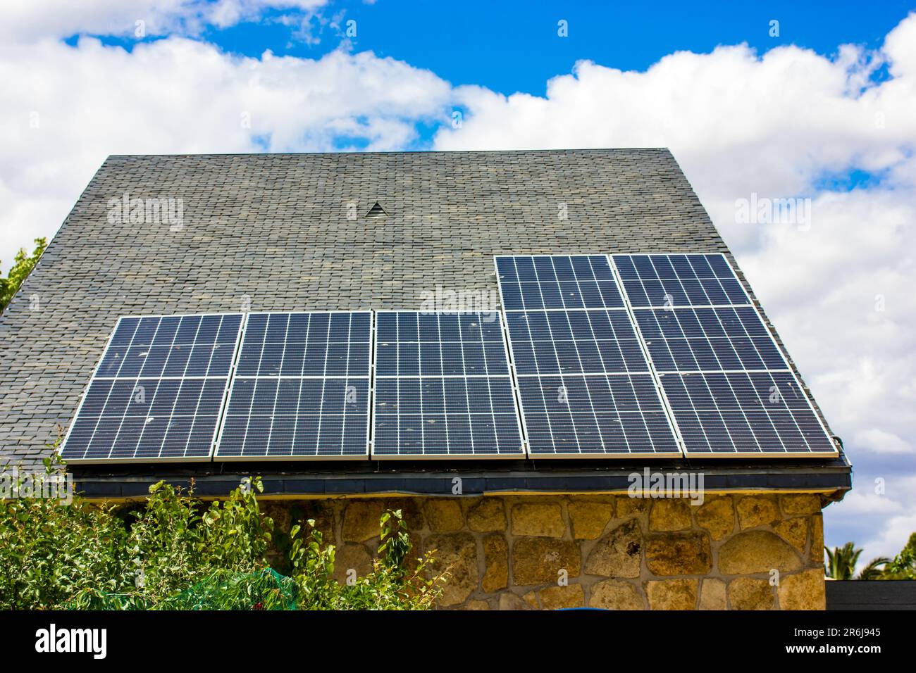 Roof of a private house with solar panels, modules for generating ...