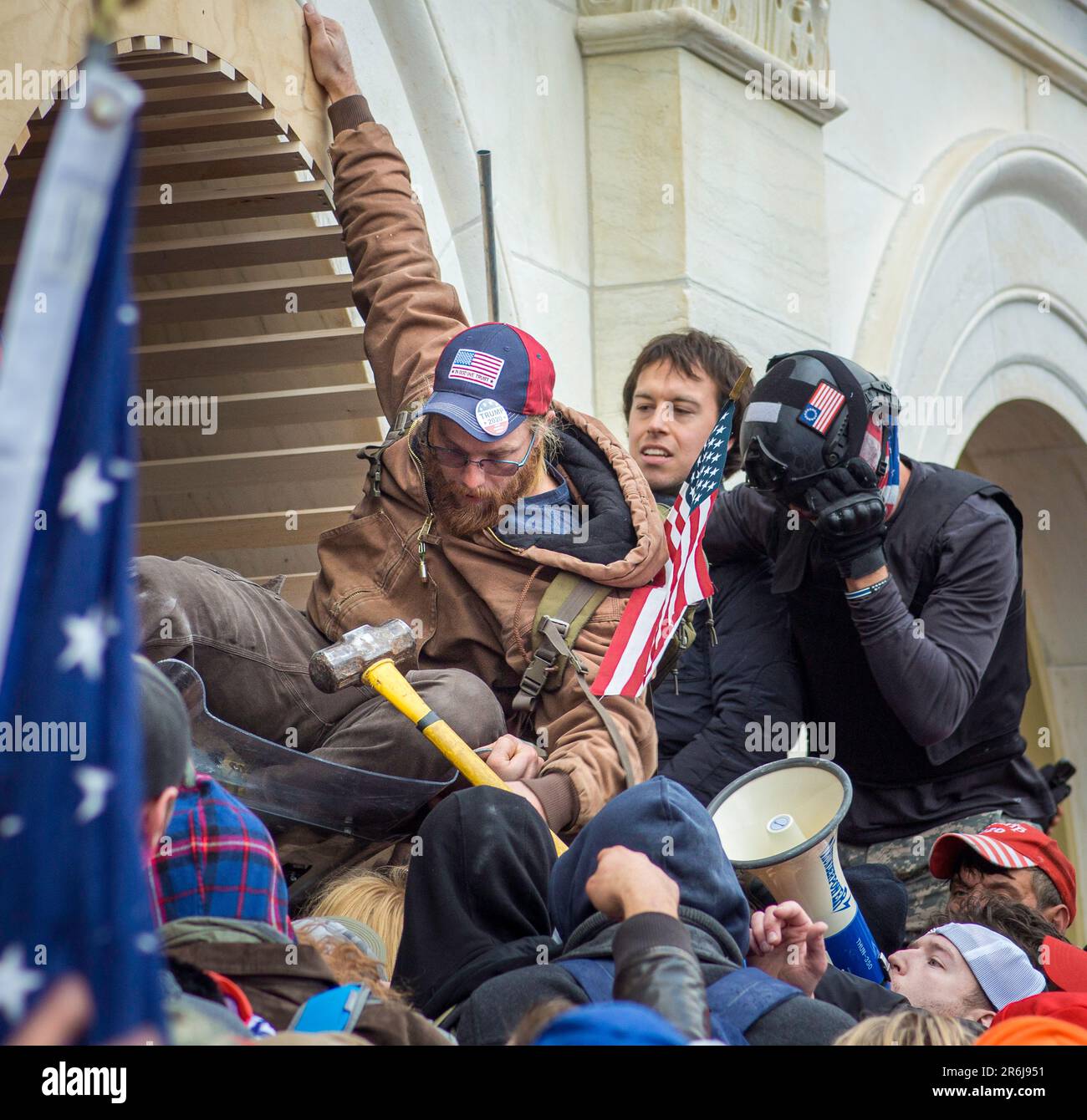 David Dempsey, seen here wearing a helmet and flag gaitor, assaults ...