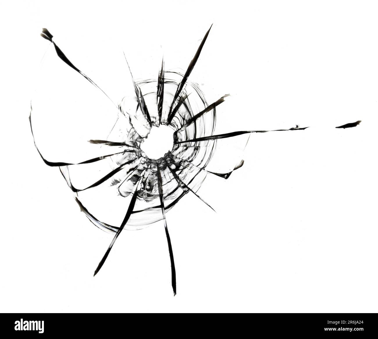 A hole in the glass on a white background. Broken window with crack ...