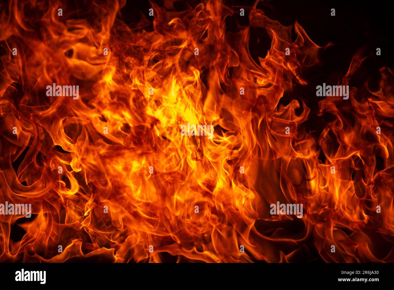 Texture of fire on a black background. Abstract fire flame background ...
