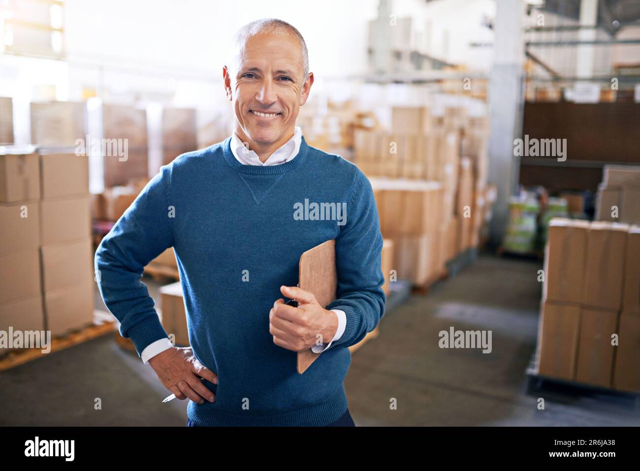Checklist, manager and portrait of man in warehouse for cargo, storage ...