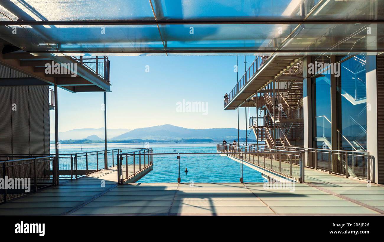 People walking along the steel walkways of the Centro Botin Museum in ...