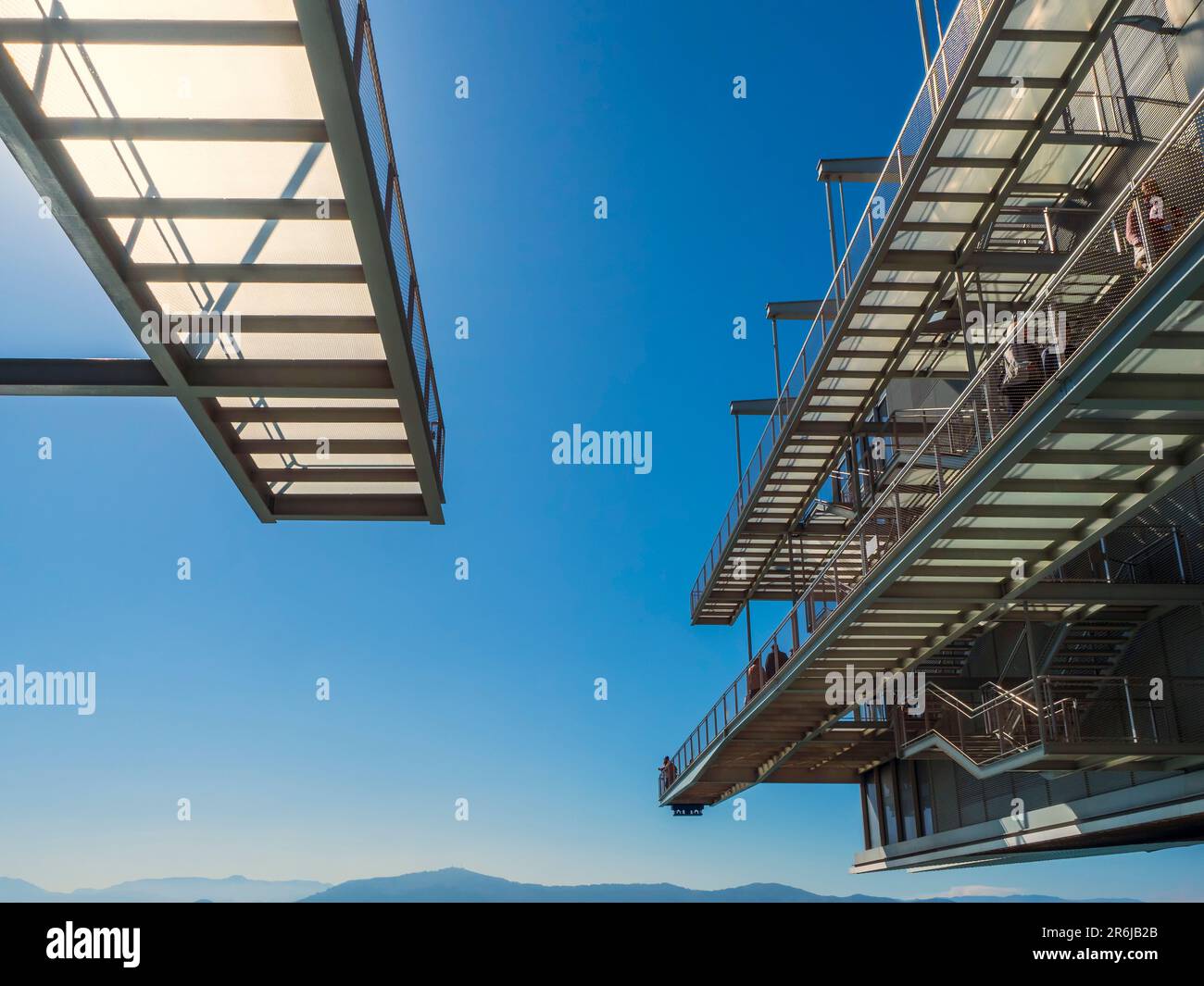 People walking along the steel walkways of the Centro Botin Museum in ...