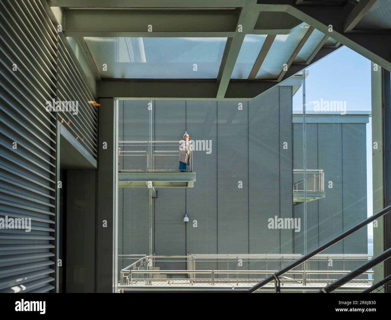People walking along the steel walkways of the Centro Botin Museum in ...