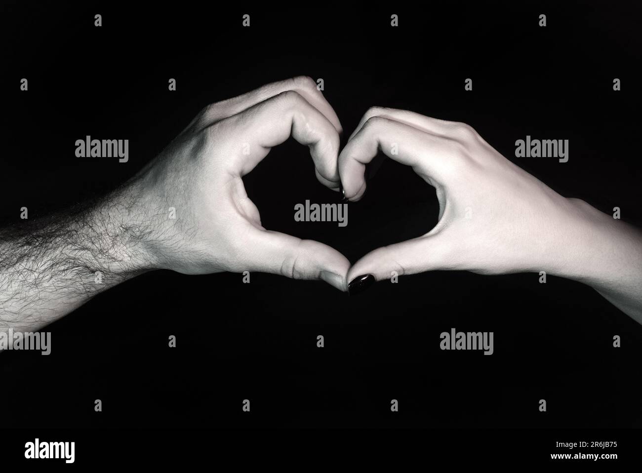 Female and male hands in form of heart. Hands in shape of love heart ...