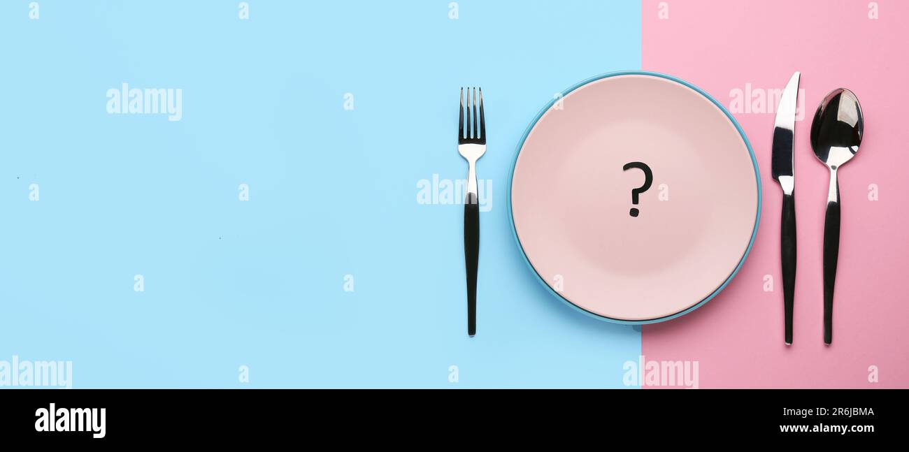 Plate with question mark and cutlery on color background with space for ...