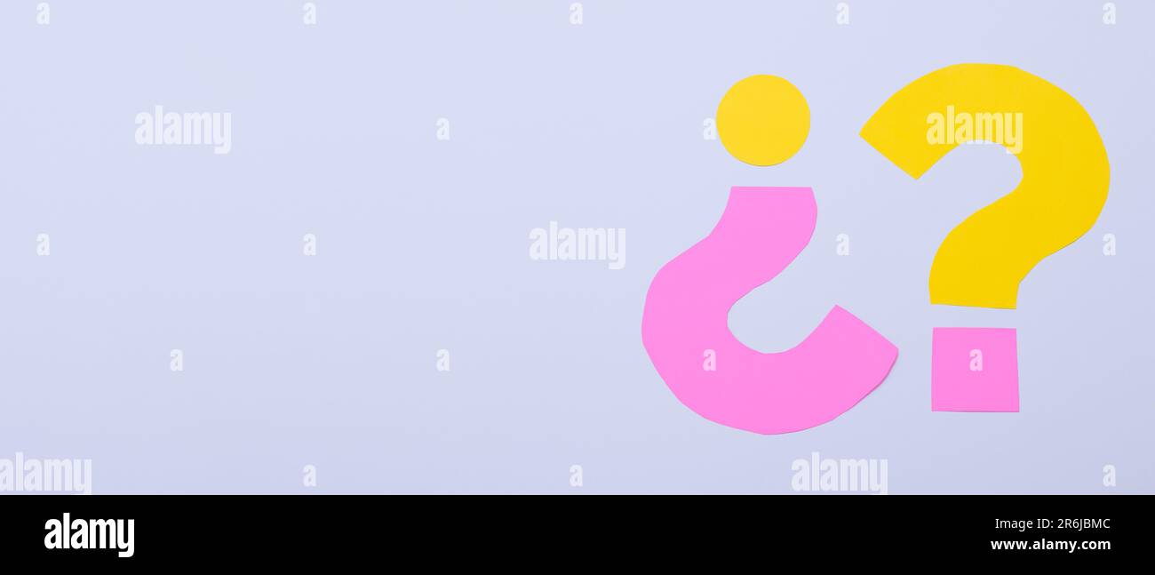 Question marks on grey background with space for text Stock Photo - Alamy