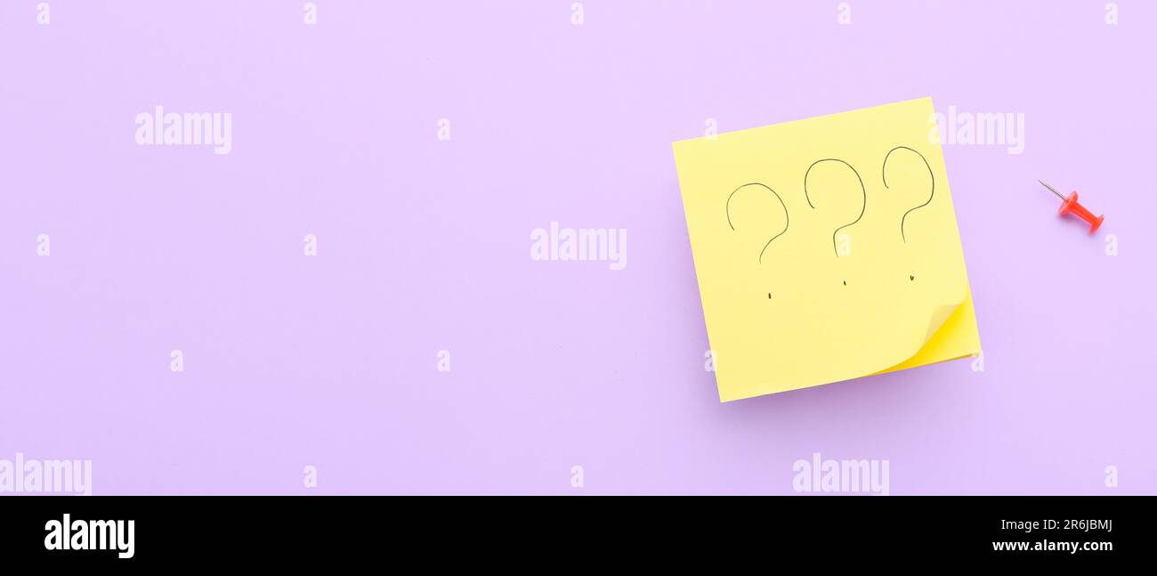 Sticky note with question marks on lilac background with space for text ...