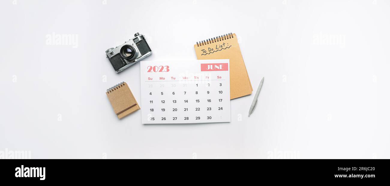 Calendar for June 2023 with to-do list and photo camera on light ...