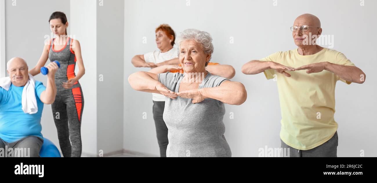 Elderly people exercising in gym Stock Photo - Alamy