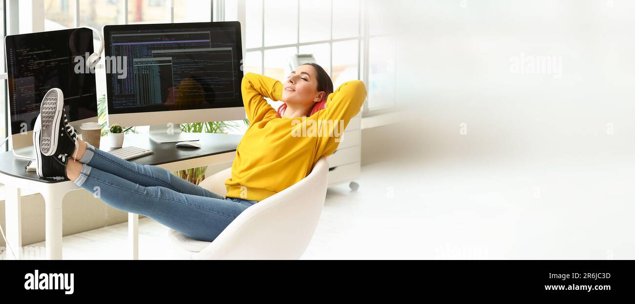 Female programmer relaxing in office. Banner for design Stock Photo - Alamy