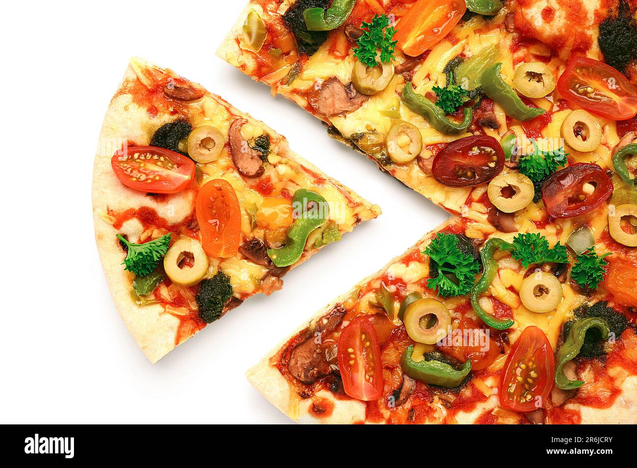 Sliced vegetable pizza on white background Stock Photo - Alamy