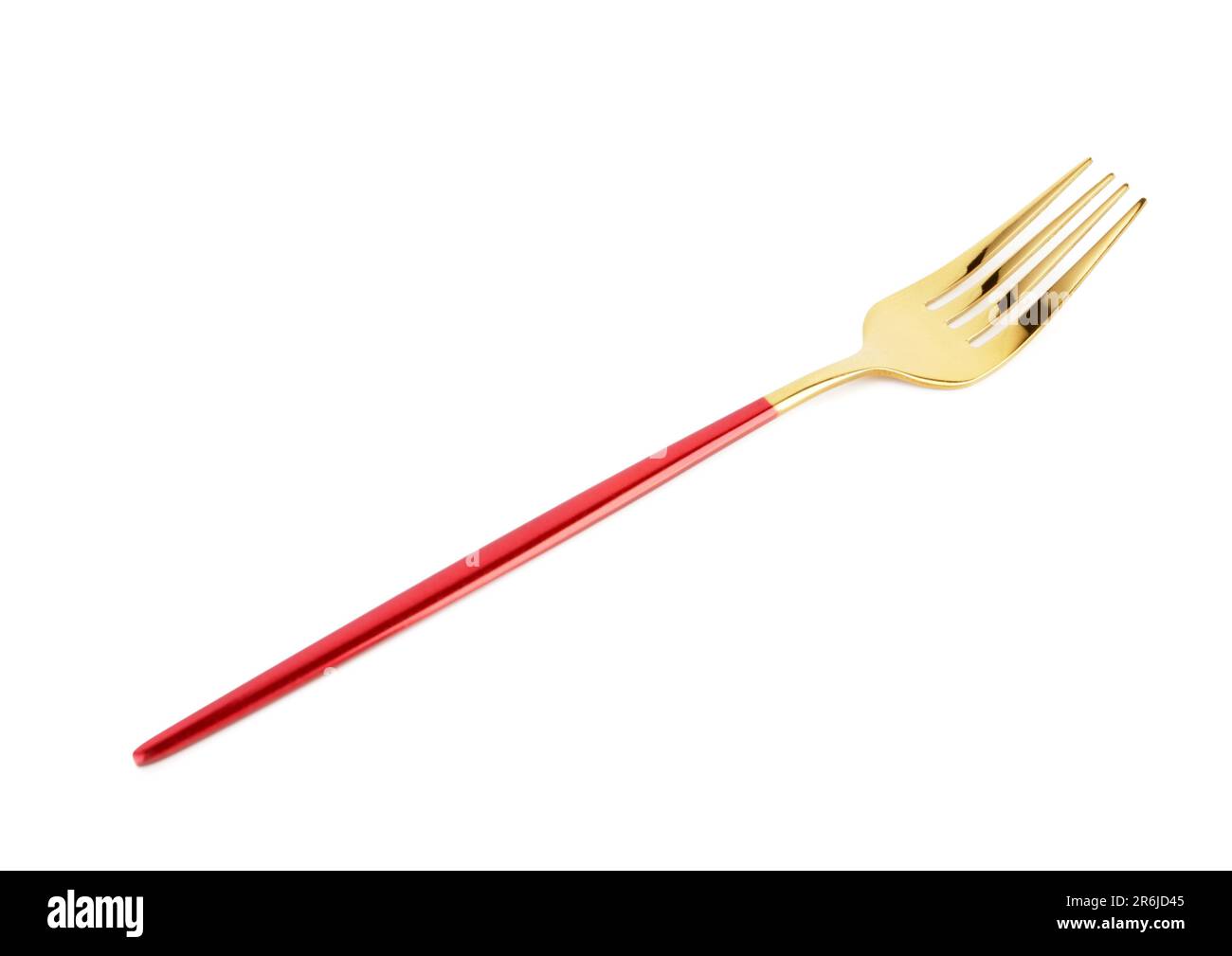 Golden fork with red handle on white background Stock Photo - Alamy