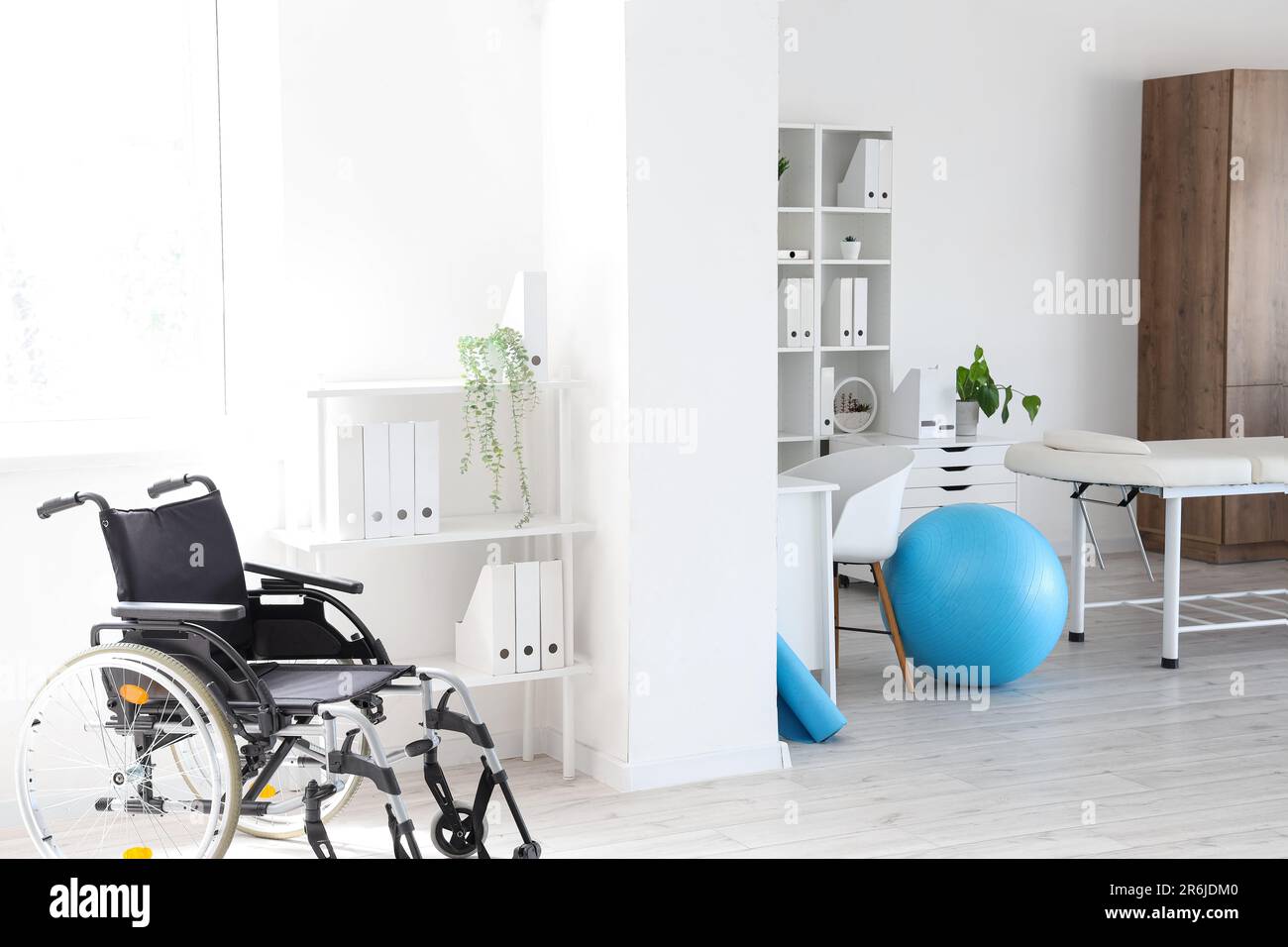 Interior of rehabilitation center with shelving units Stock Photo - Alamy