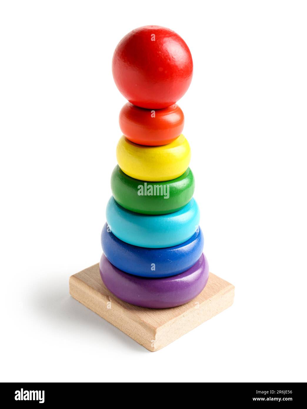 Wooden colorful toy pyramid isolated on white background. Children's ...
