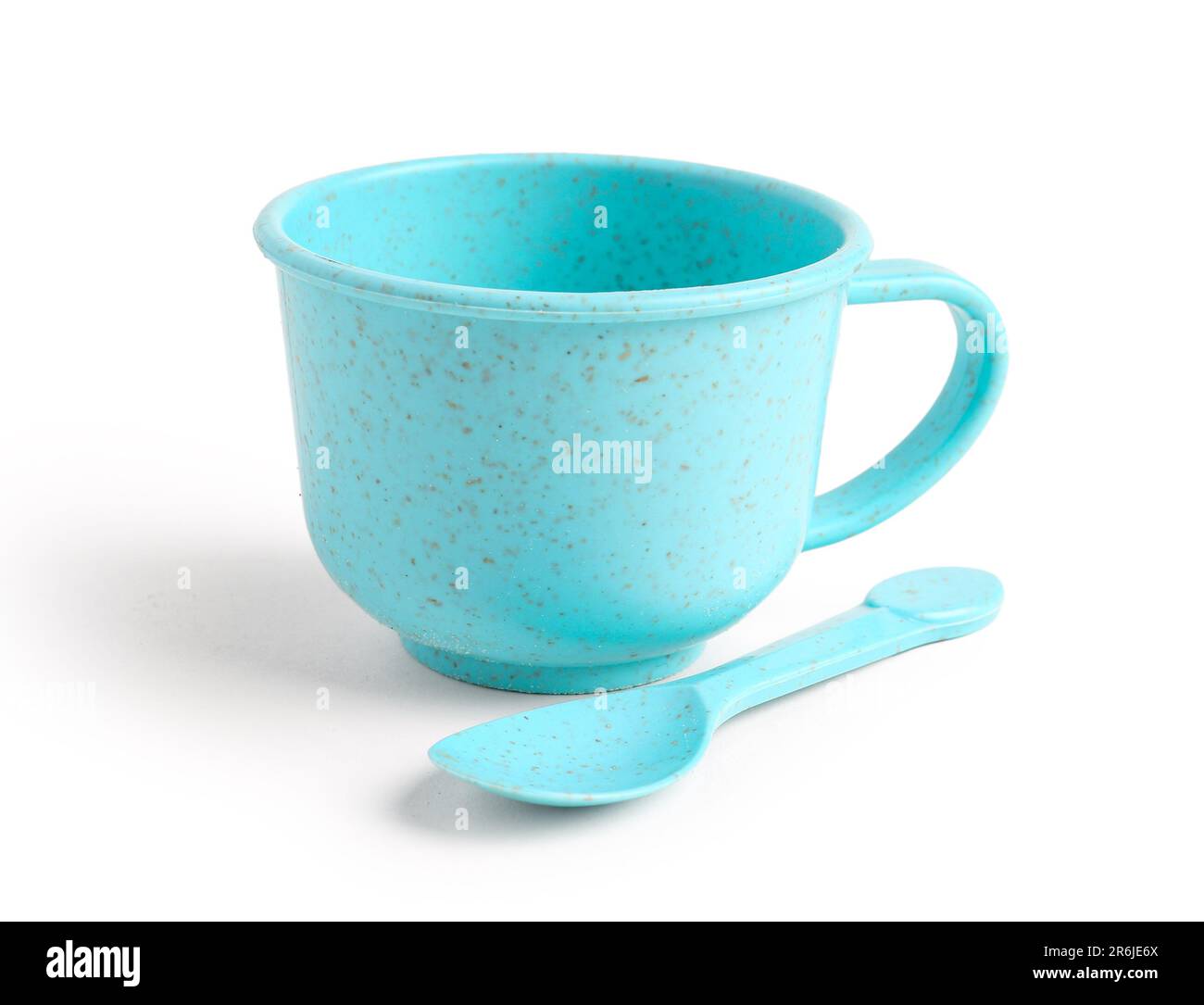Blue cup with spoon isolated on white background. Children's Day ...