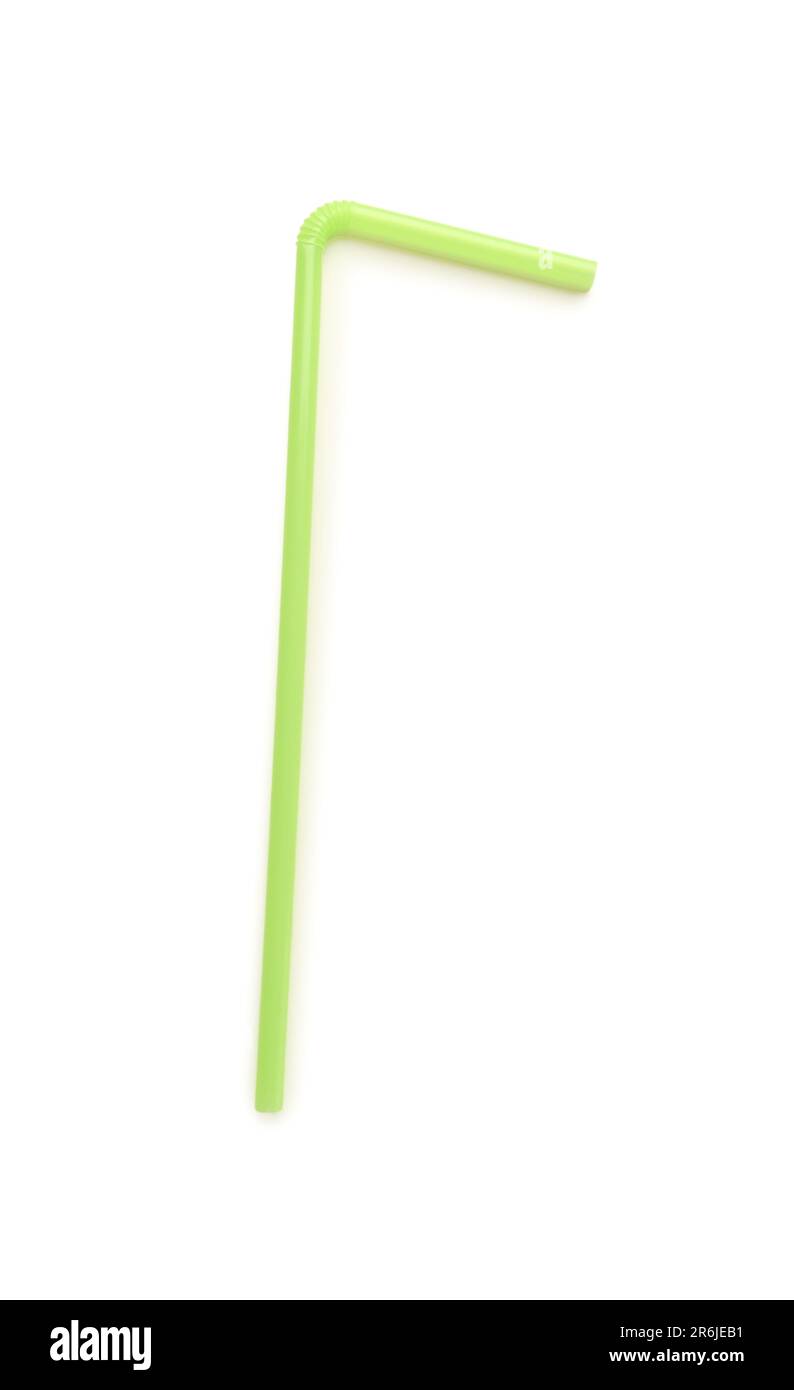 Green plastic straw on white background Stock Photo - Alamy