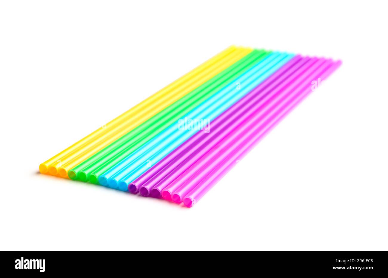 Different plastic straws on white background Stock Photo - Alamy