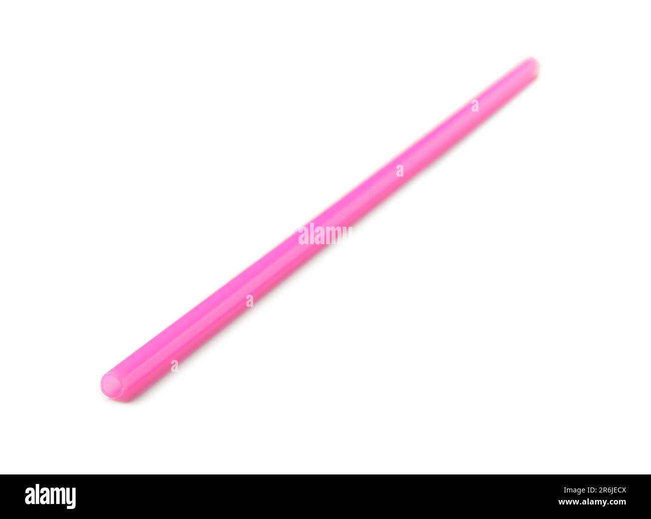 Pink plastic straw on white background Stock Photo - Alamy