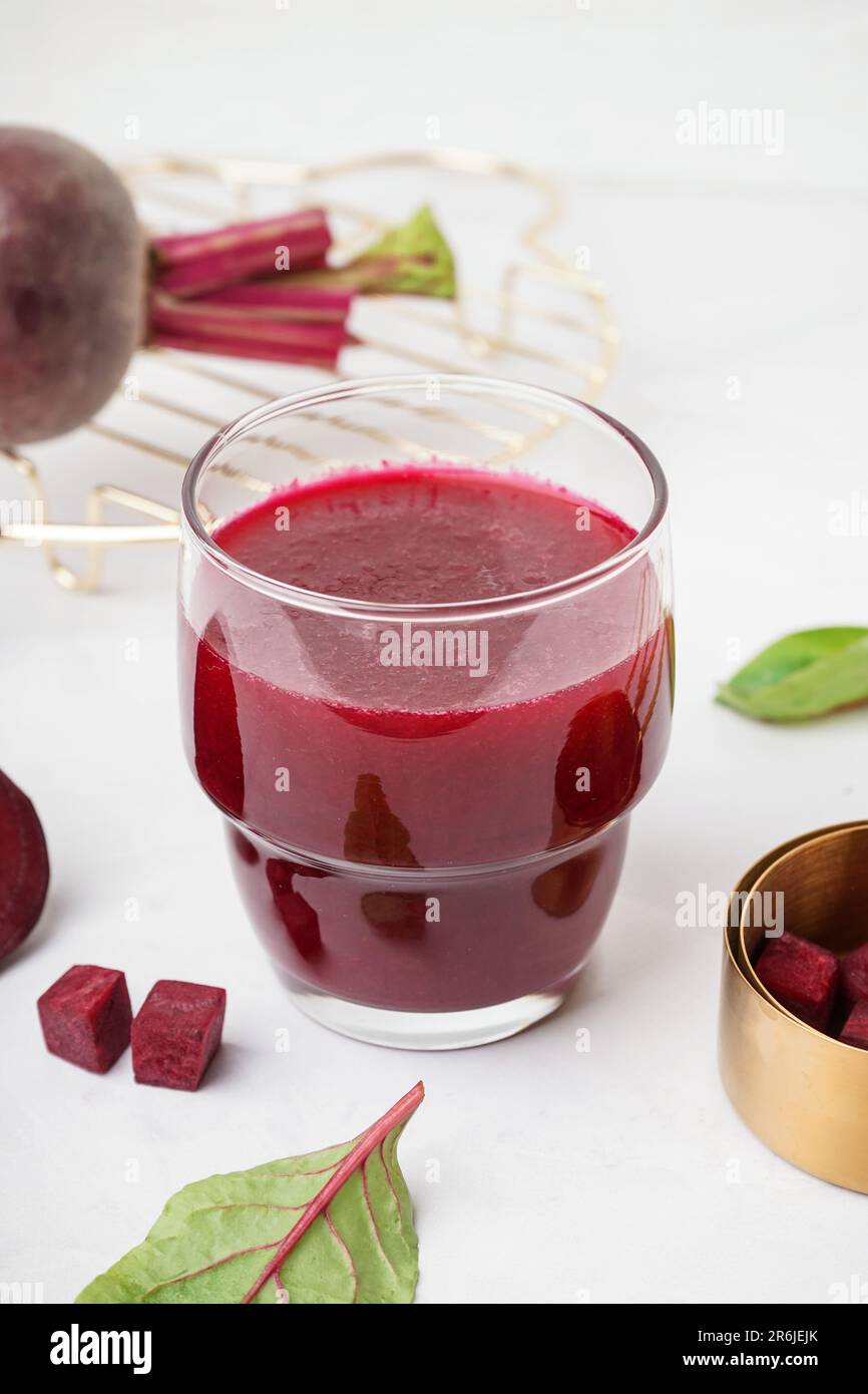 Glass of fresh beetroot juice on white background Stock Photo - Alamy