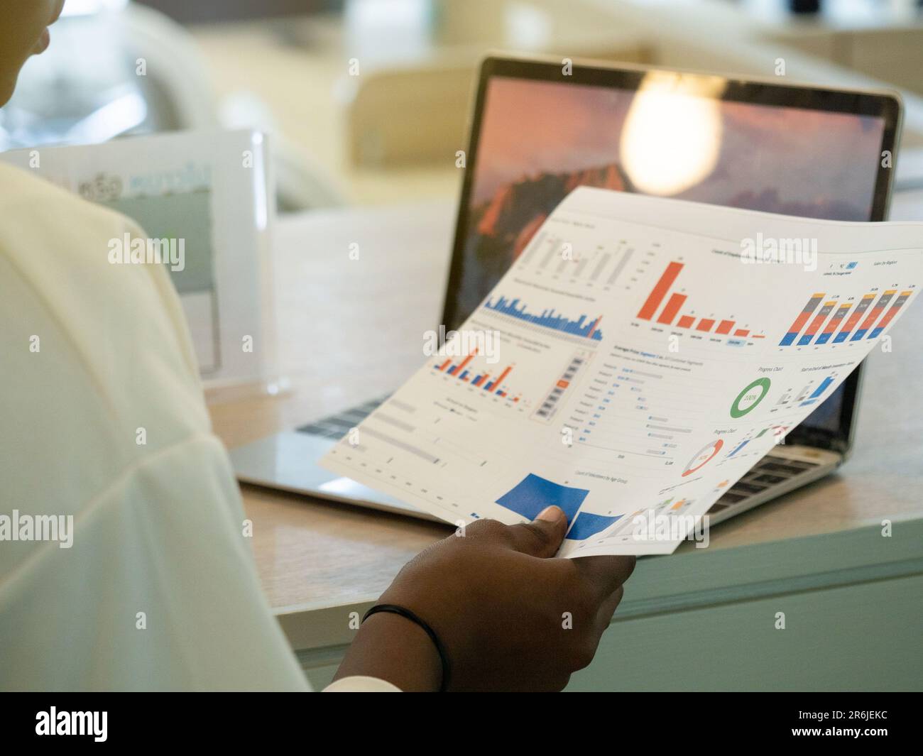 Corporate colleague laptop chart hi-res stock photography and images ...