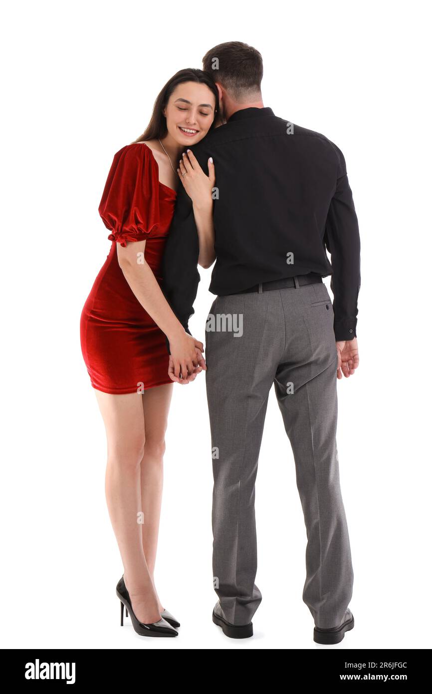 Happy engaged couple on white background Stock Photo - Alamy
