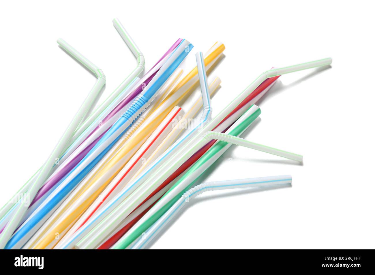 Different plastic drinking straws on white background Stock Photo - Alamy
