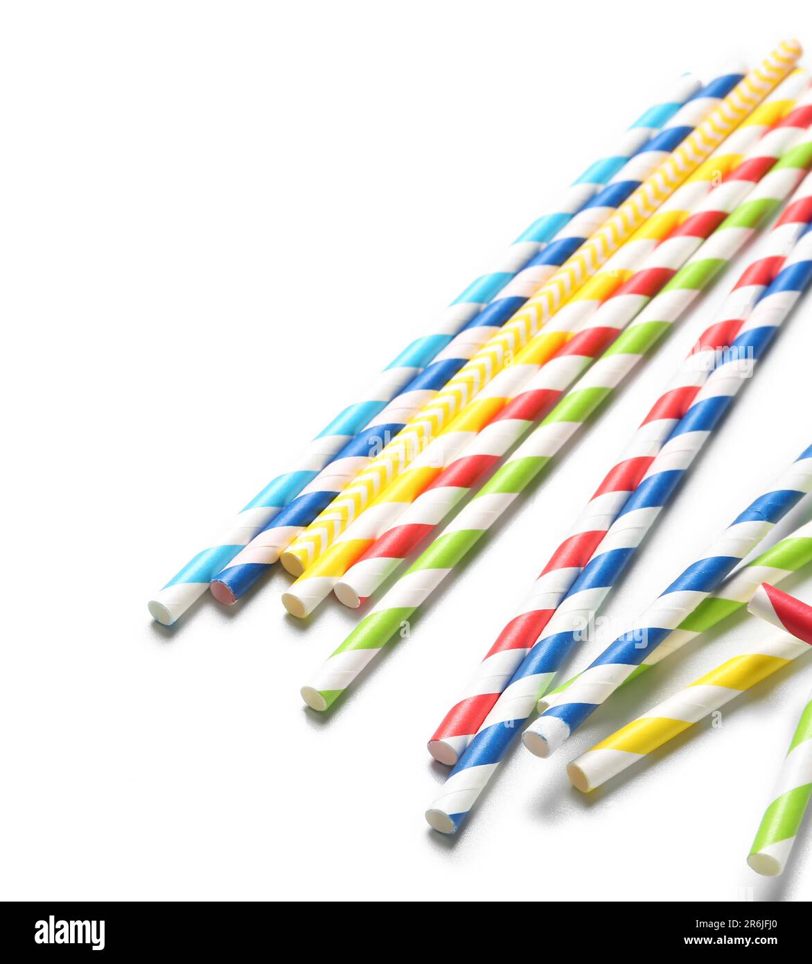 Different paper drinking straws on white background Stock Photo - Alamy