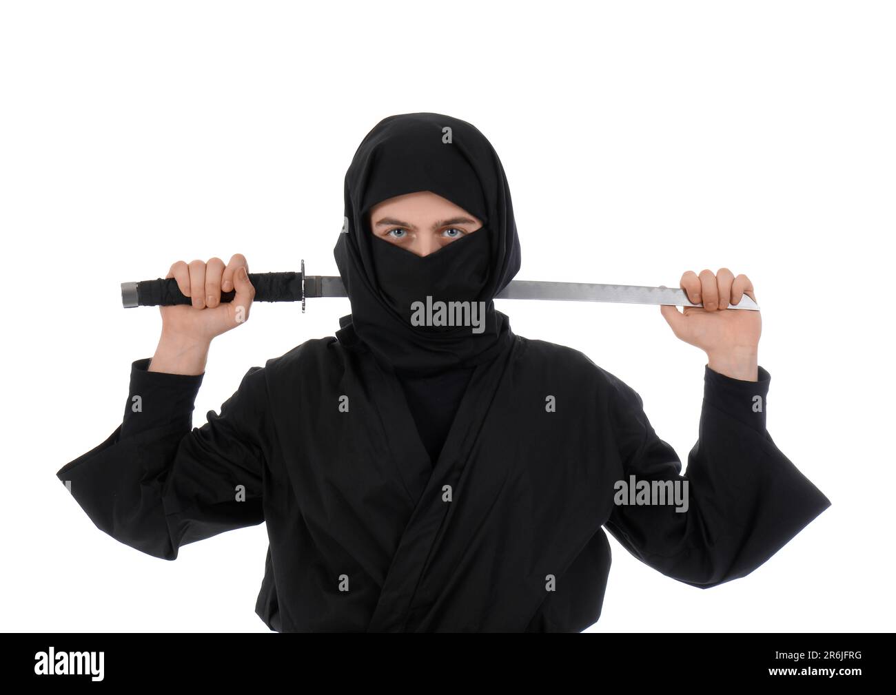 Male ninja with sword on white background Stock Photo - Alamy