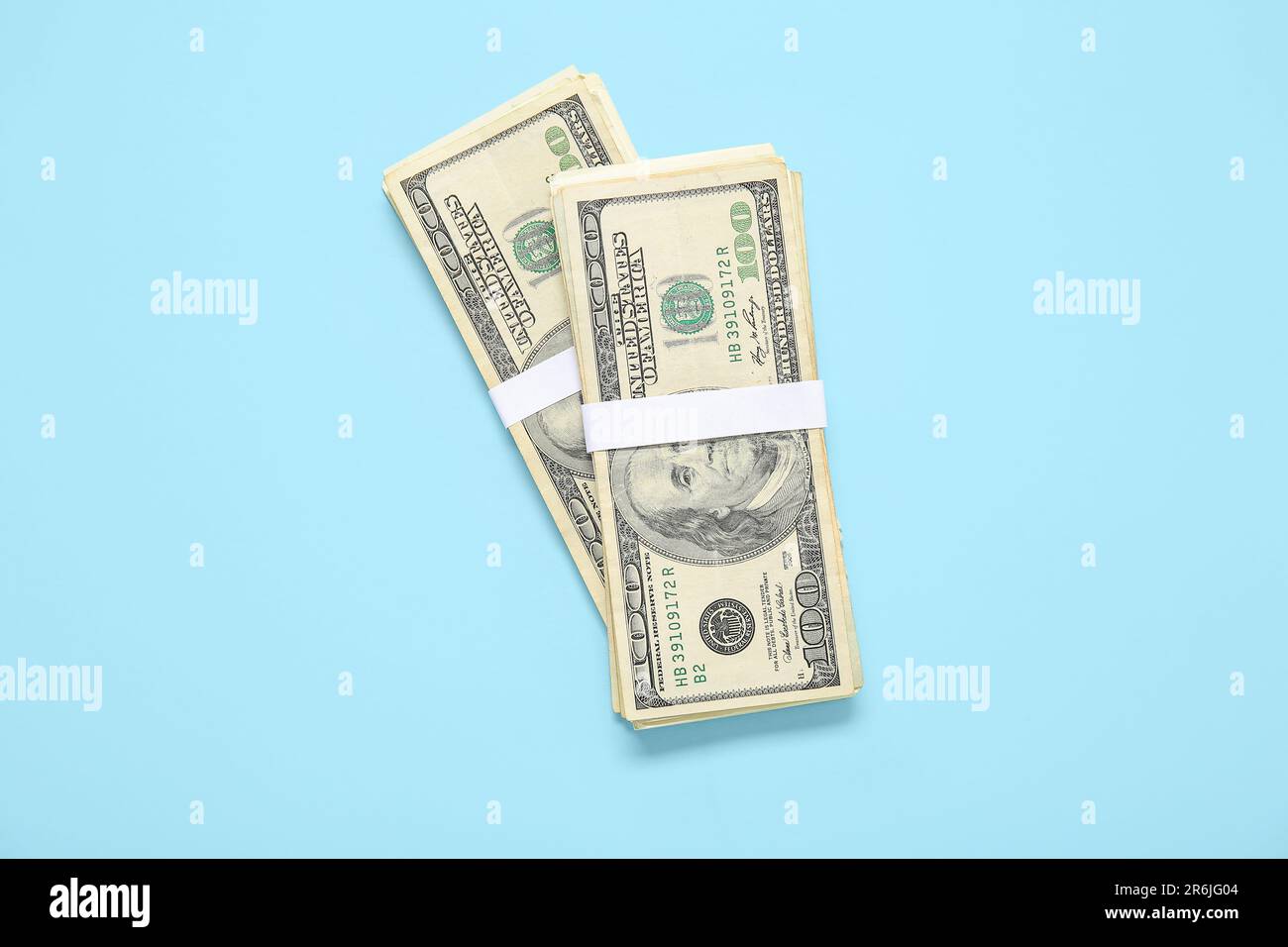 Bundles of hundred dollar bills hi-res stock photography and images - Alamy