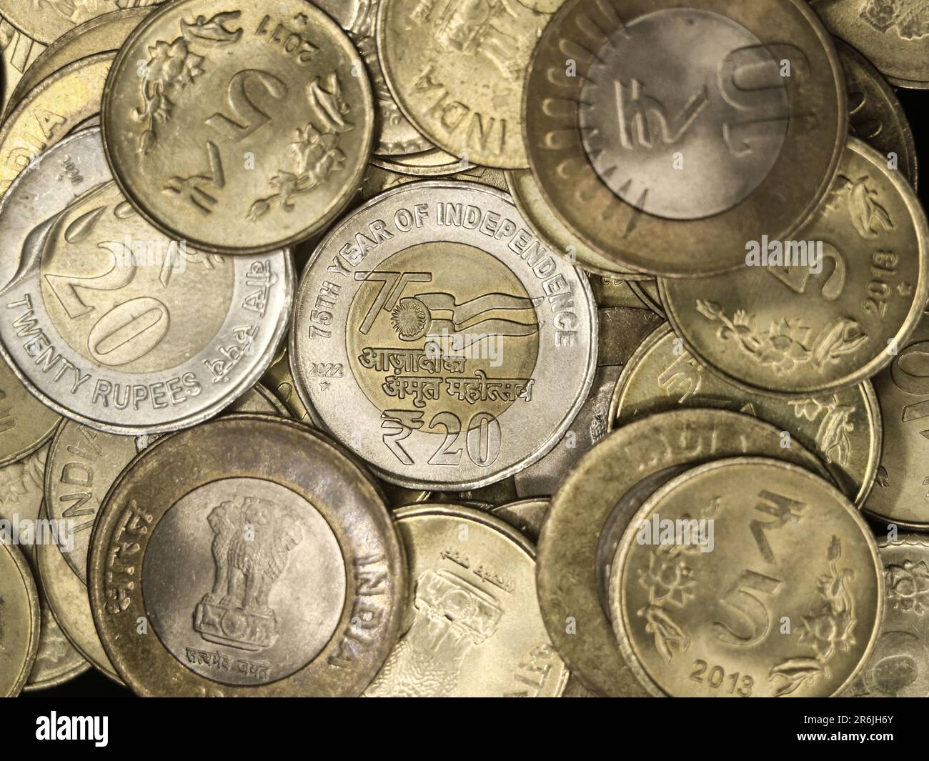closeup shot of a rare indian 20 (twenty) rupees coin gold and silver ...