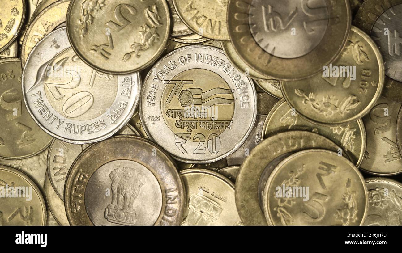 closeup shot of a rare indian 20 (twenty) rupees coin gold and silver ...