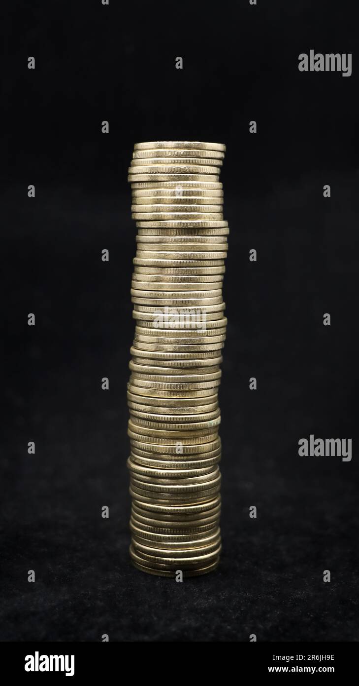 Tall tower of coins hi-res stock photography and images - Alamy