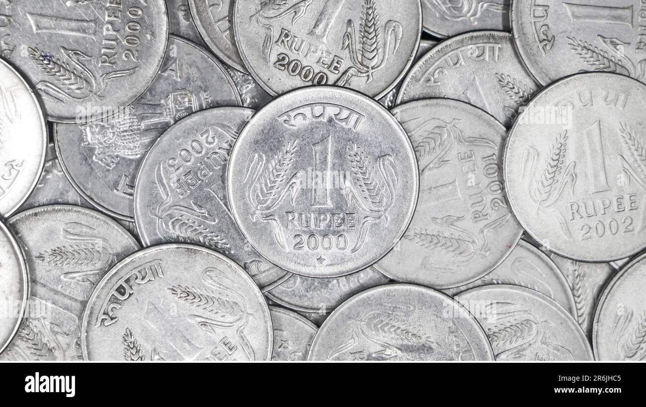 top view of a large collection of shiny old 1 or one rupee vintage ...