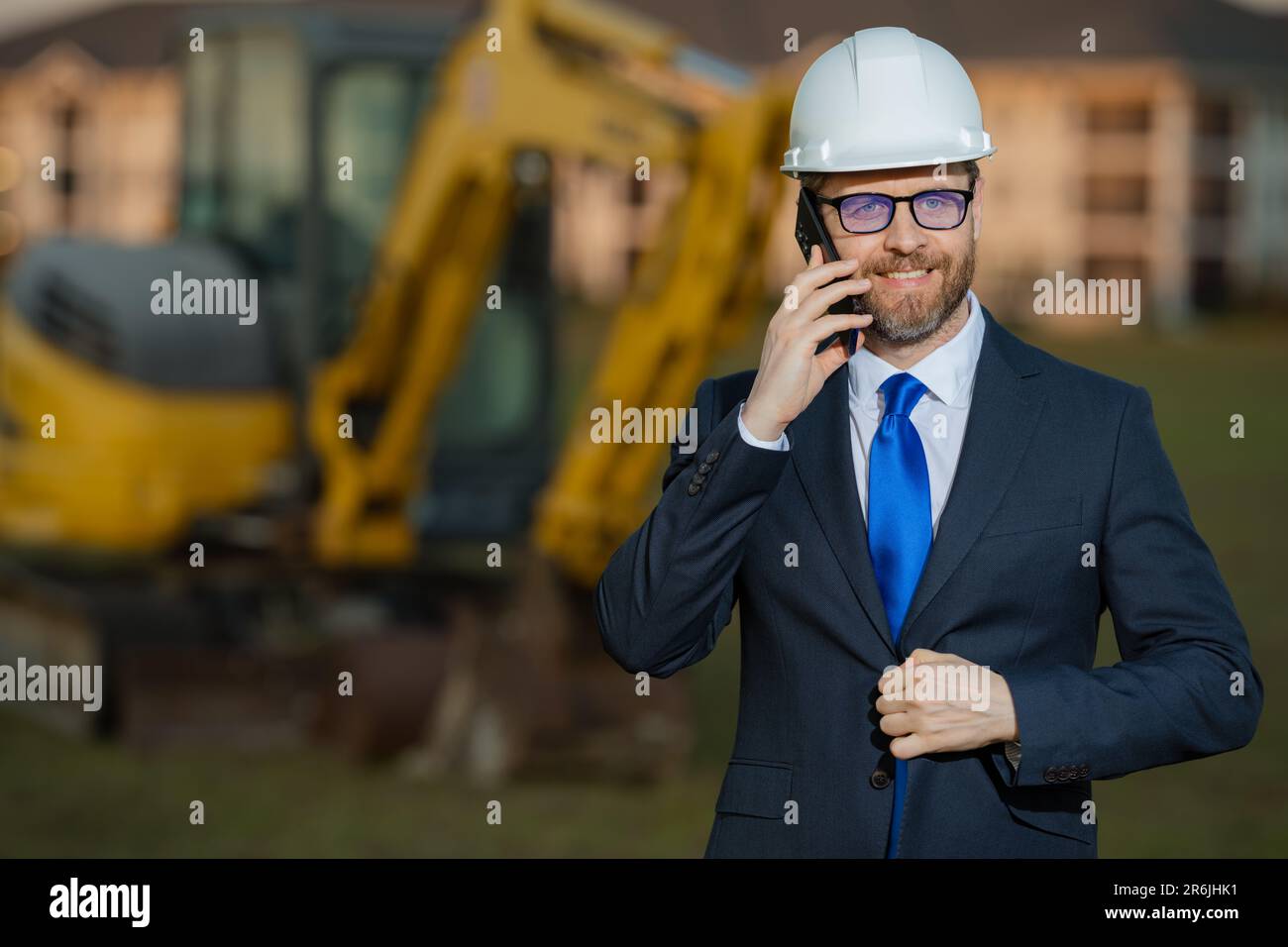 Supervisor in suit and helmet. Investor civil engineer, construction ...