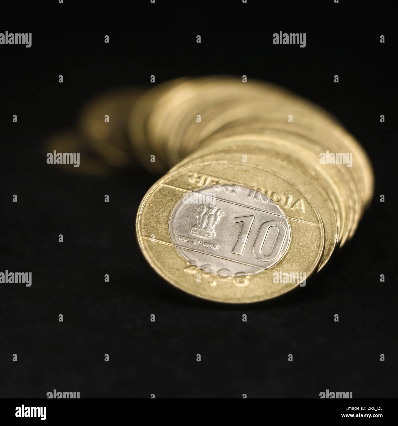 closeup shot of rare antique gold and silver indian ten (10) rupee ...