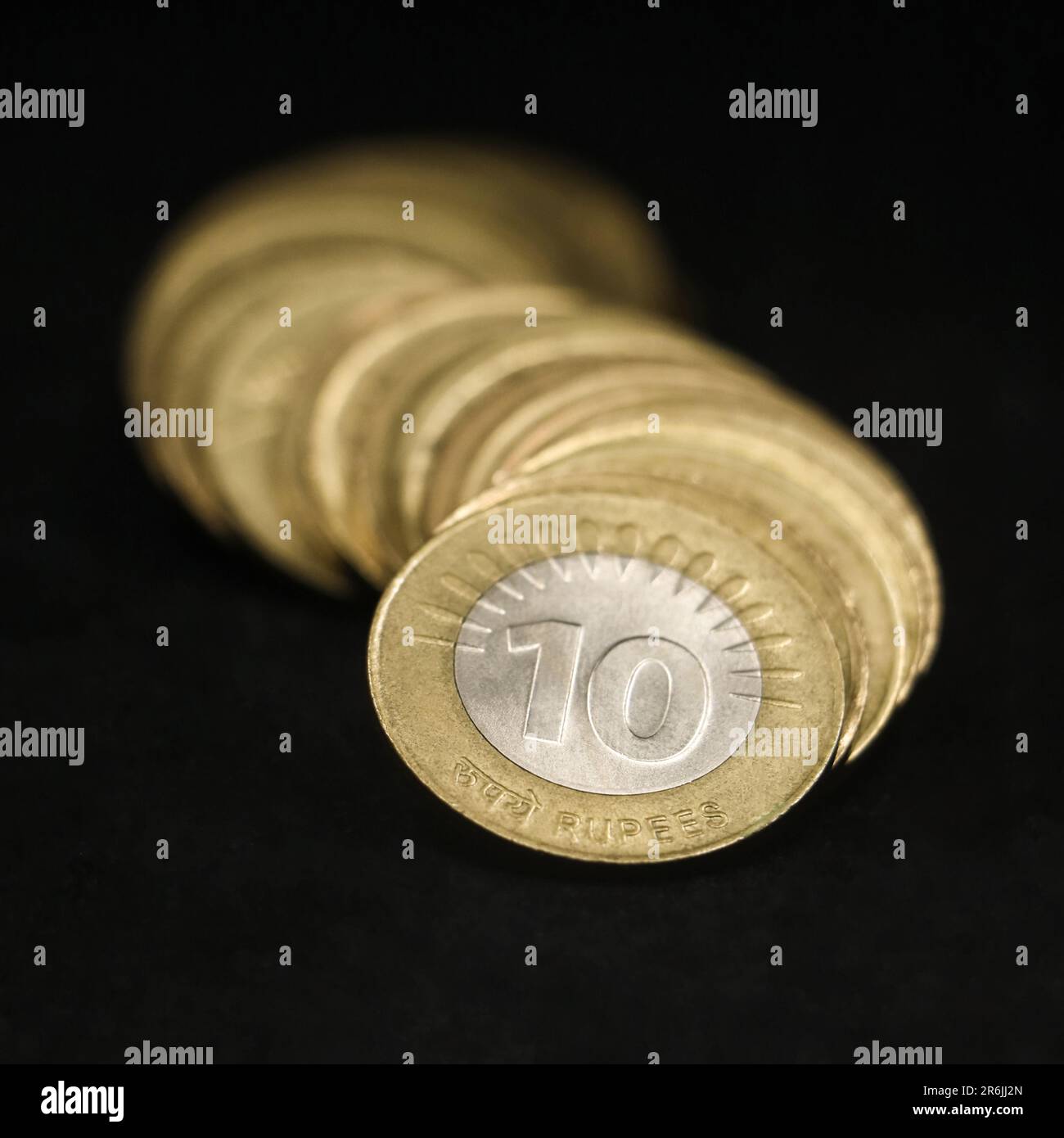 closeup shot of rare antique gold and silver indian ten (10) rupee ...