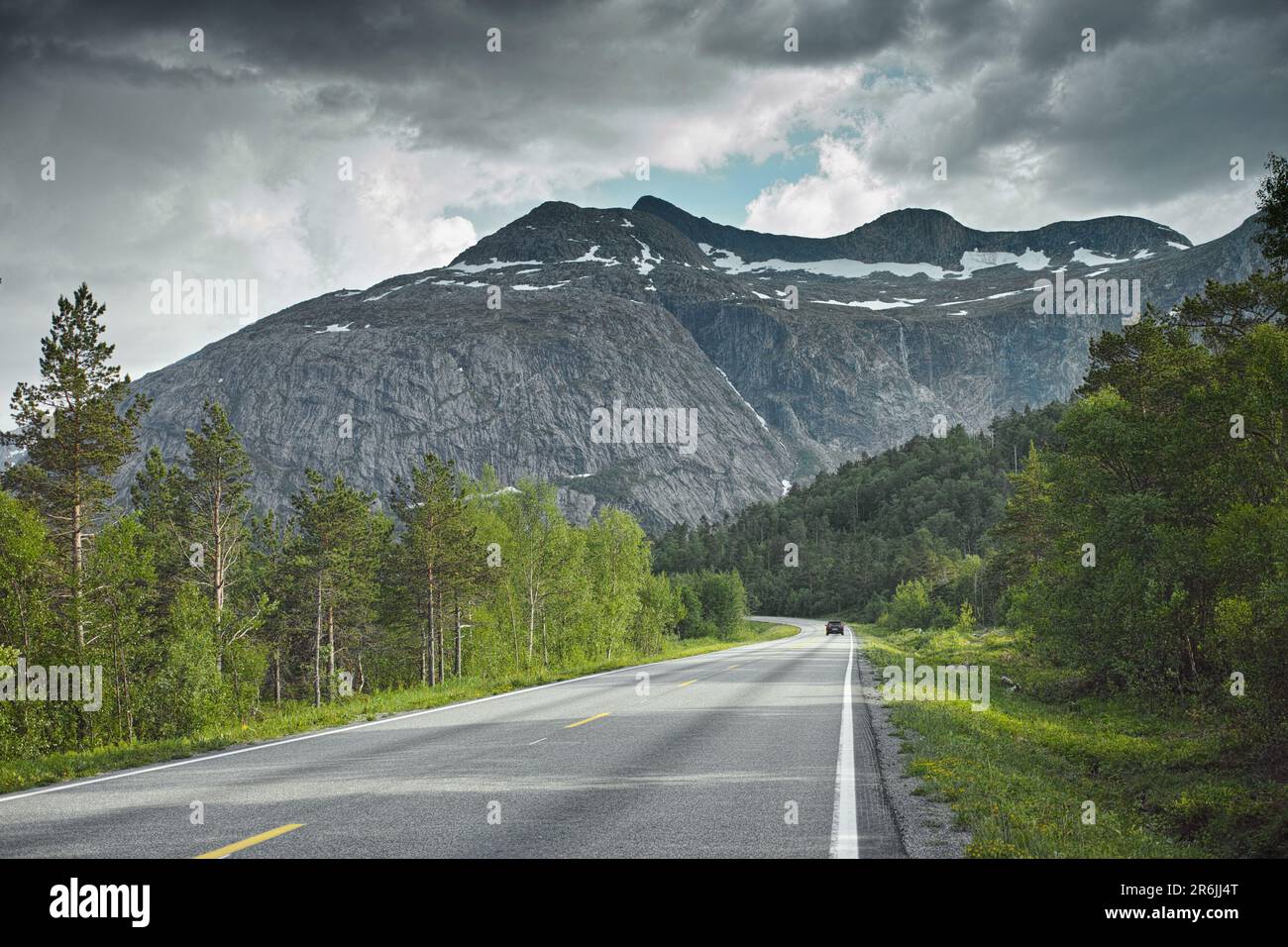 Road, mountain and travel landscape, trees and nature with direction ...